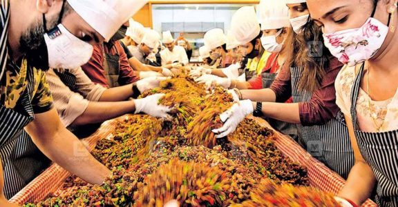 Bakeries celebrate elaborate cake mixing ceremonies to ring in ...