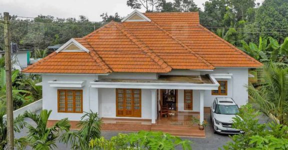 This single-storey Muvattupuzha house is the perfect gift from a son to ...