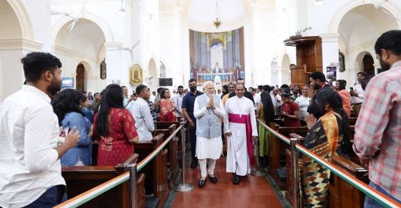 PM Modi visits Delhi church on Easter Day, plants sapling | Manorama ...