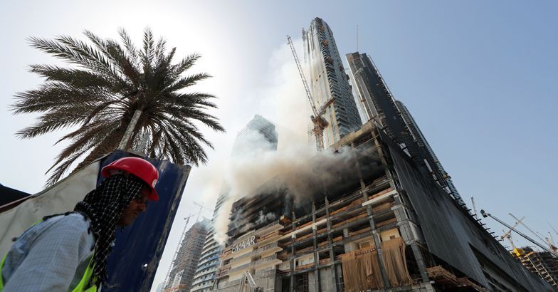 Fire breaks out at building near Dubai's Burj Khalifa, no casualties ...