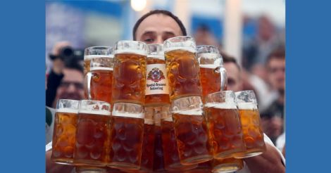 German beats his own world record for carrying 29 beer mugs | Beer mugs ...